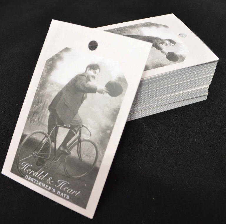 Custom printed hang tag swing ticket shop product label printing